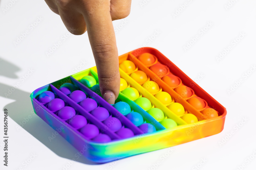 Pop It silicone sensory anti-stress Fidget toy, female hand push ...