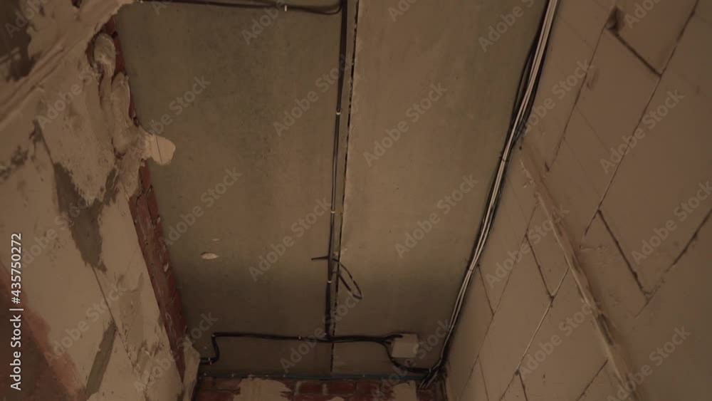 Electrical wiring in the ceiling. Fix boxes, cable channels indoors ...