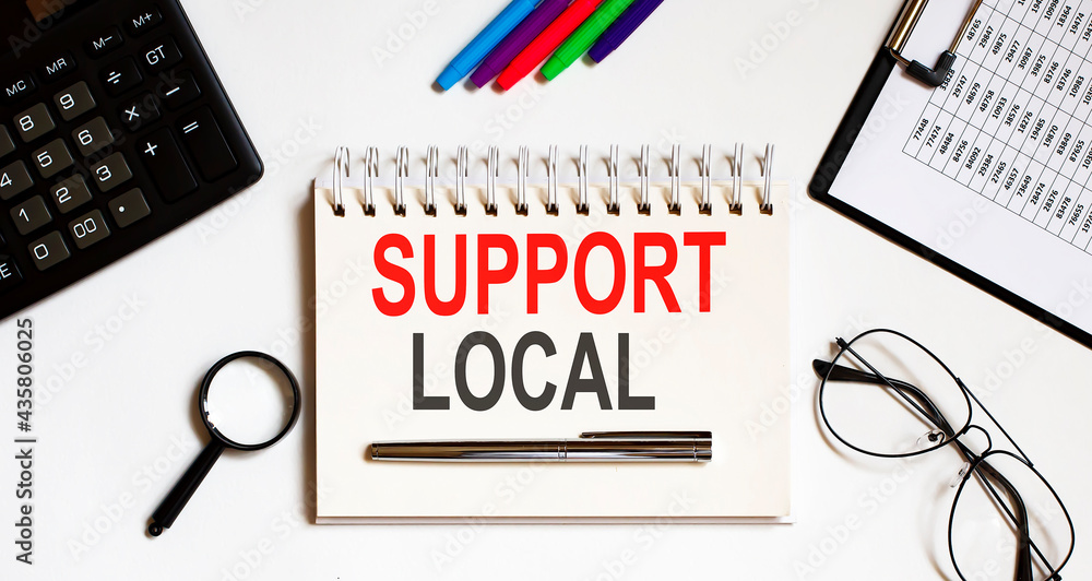 Keyboard of charts, calcualtor, pencil and notepad with text SUPPORT ...