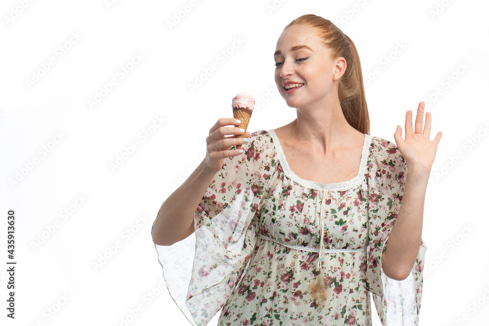 Red hair model eating ice-cream in studio Stock Photo | Adobe Stock