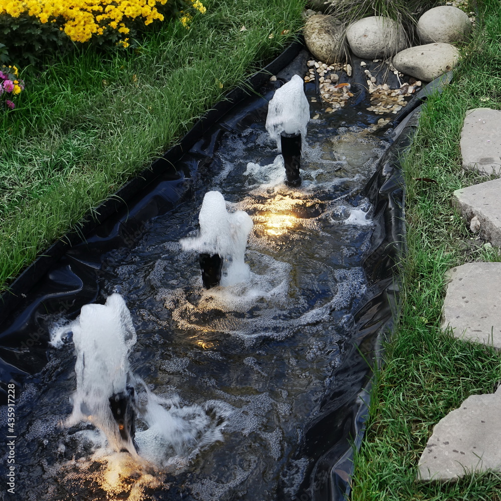 Artificial PVC Pond in Garden with Lanterns and Fountains. Small ...