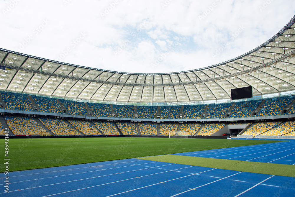 Panoramic view of soccer field stadium and stadium seats. Olympic ...