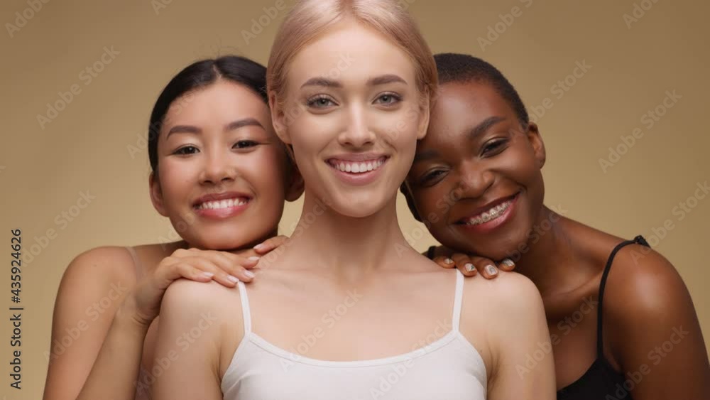 Female friendship and connection. Three happy multiethnic ladies posing ...