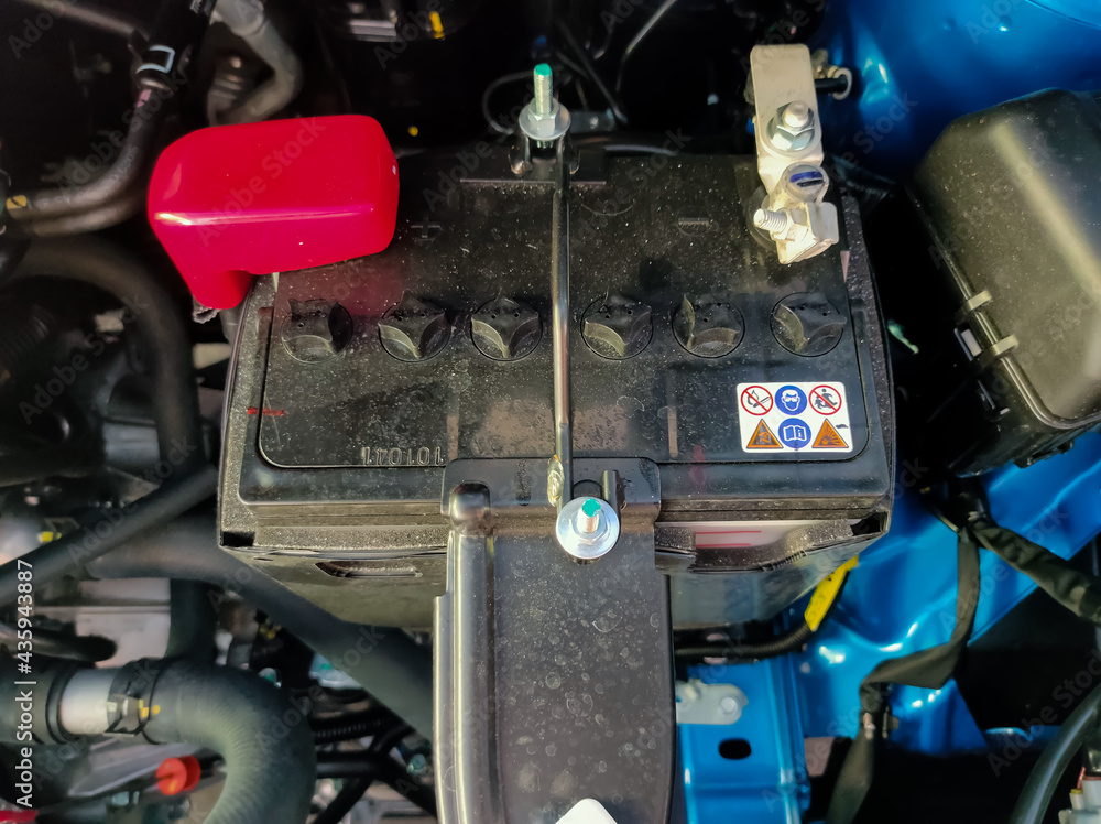 Malaysia, Perak, 16 May 2021: Battery on the new PRODUA ALZA car. Shot ...