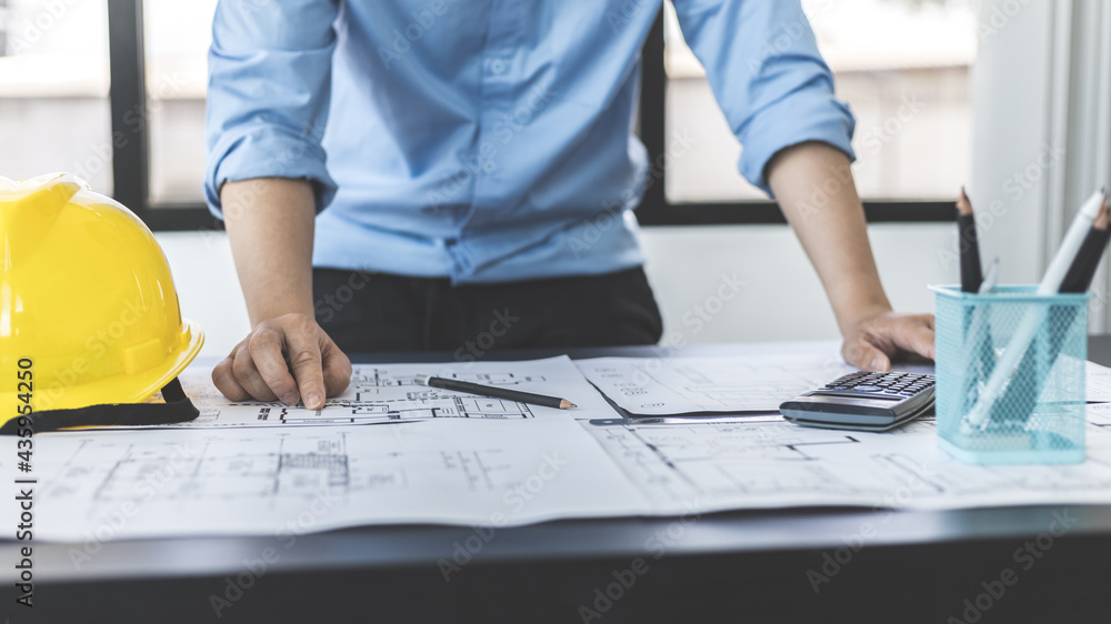 Architectural building design and construction plans with blueprints ...