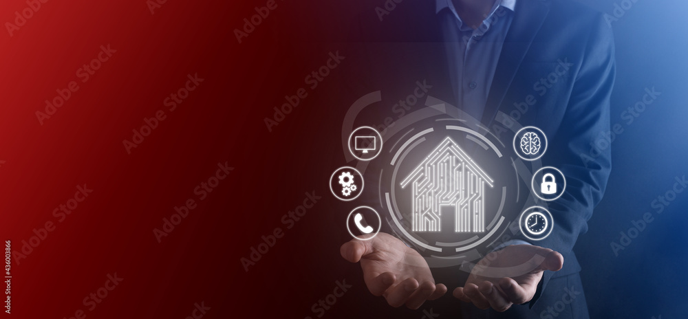 Businessman hold house icon.Smart home controlled, intelligent house ...