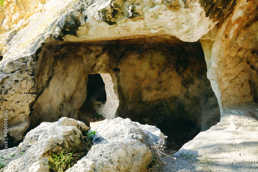 Cave-monastery, catacomb, crypt, sepulchre. The entrance to the dungeon ...
