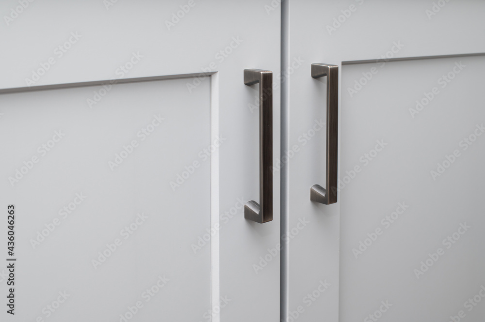 Photo & Art Print Handles on the doors of the kitchen cabinet, Victor
