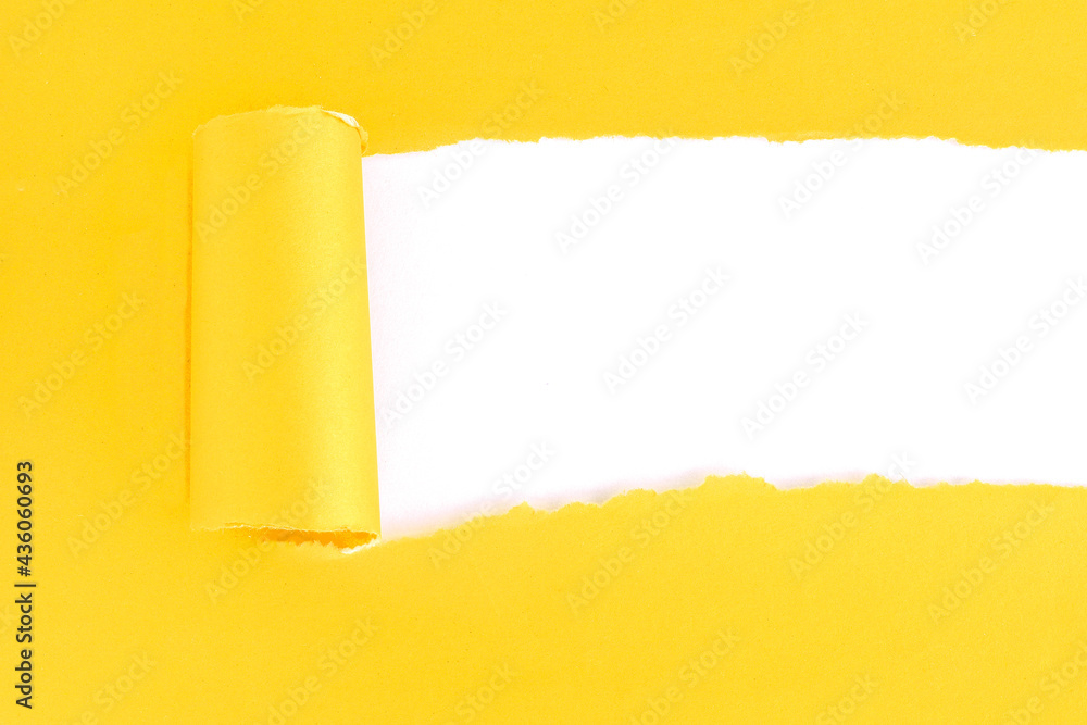 Torn paper roll with opening showing white background, Ripped yellow ...