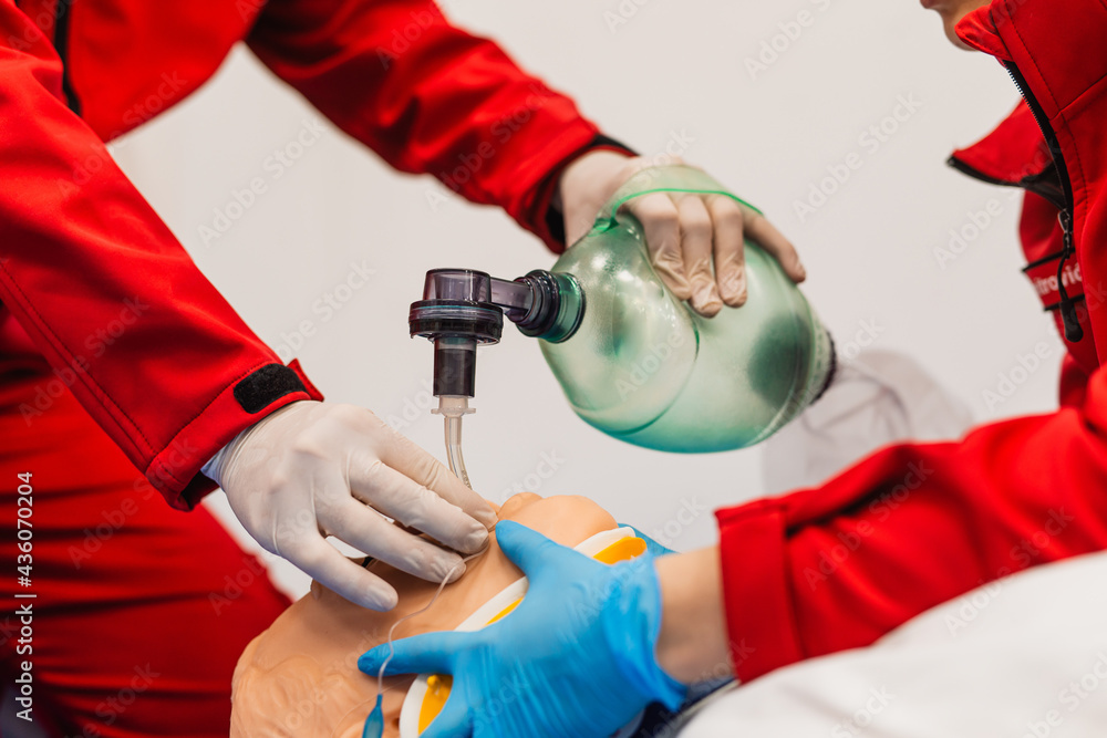 First Aid Training - CPR training medical procedure, Using an oxygen ...