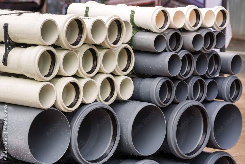 Foto de Plastic main pipes. A heap of polyethylene pipes for a water ...