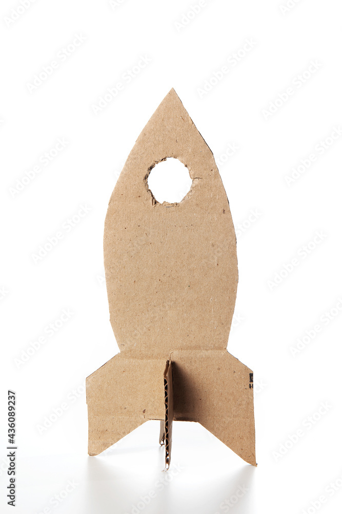 Rocket made of cardboard on a white background. Children art project ...