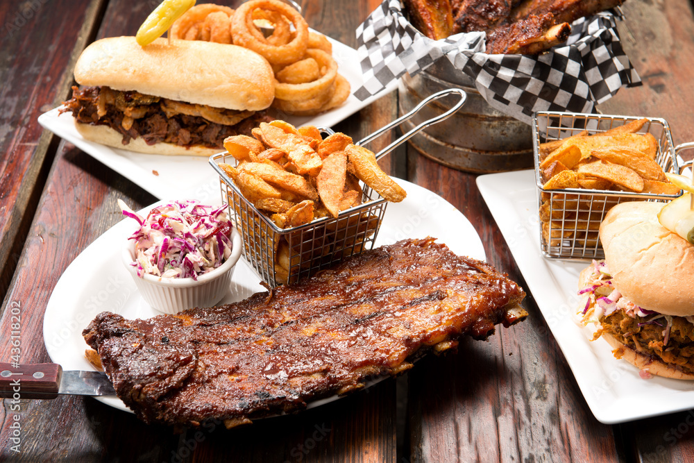 Barbecue restaurant food selection. Barbecued pork ribs, beef ribs ...
