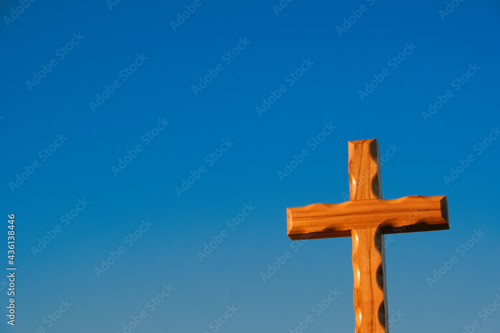 Cross on blue sky background. Christianity and Catholicism religion ...