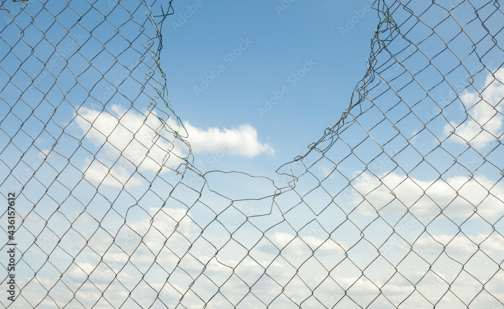 Broken metal mesh fence Stock Photo | Adobe Stock