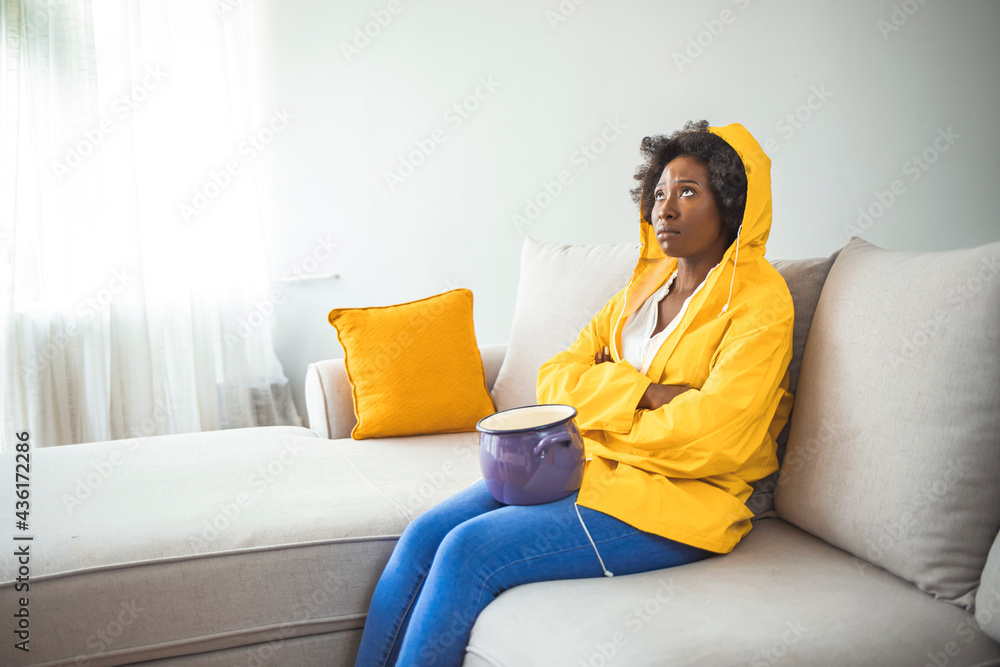 House Ceiling is Flowing - Woman Holding Bucket While Water Droplets ...