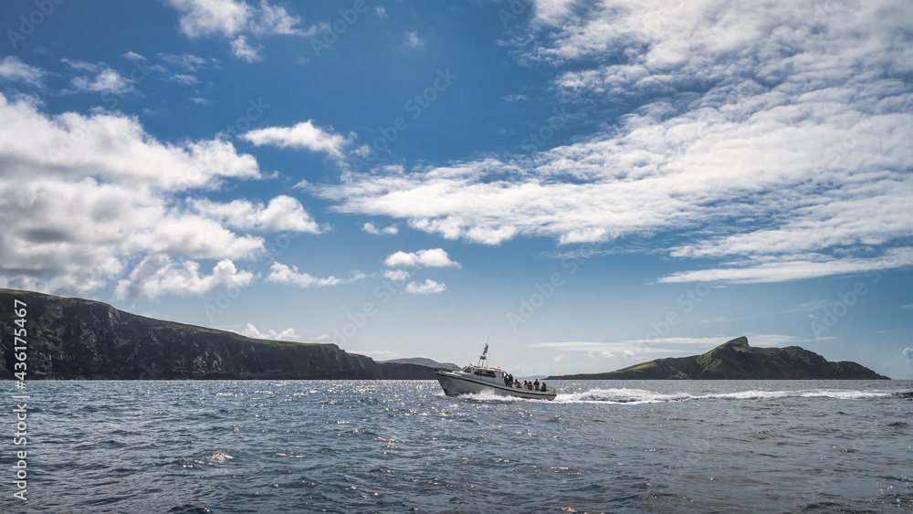 Tourists on a boat cruise to visit Skellig Michael island where the ...