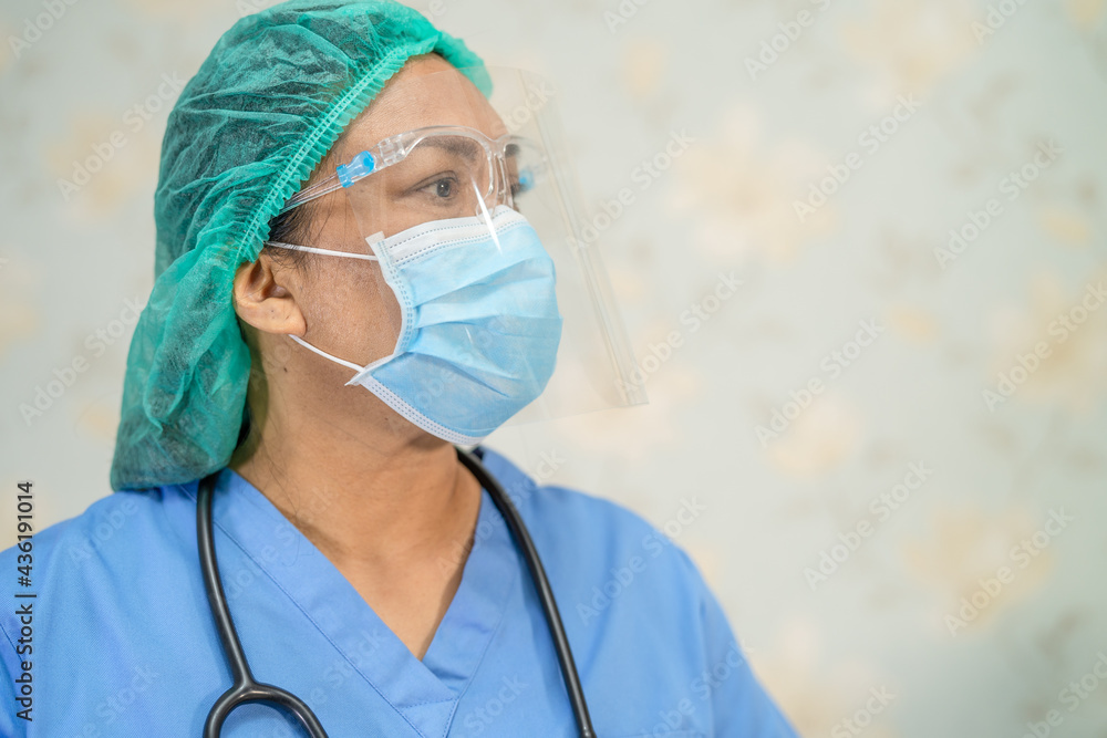 Asian doctor wearing face shield and PPE suit new normal to check ...