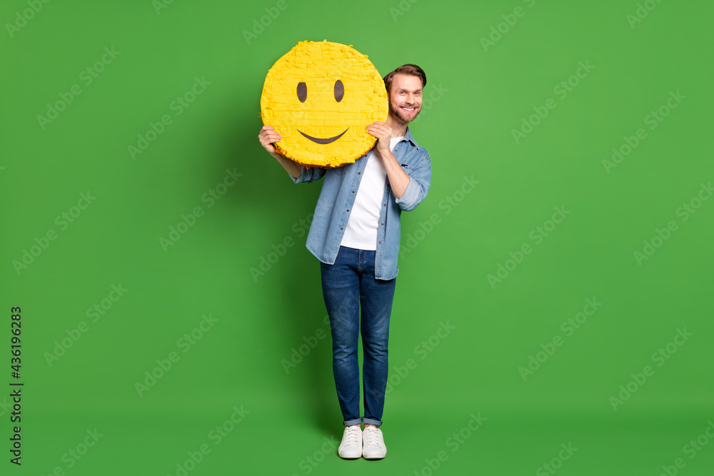 Full length body size photo of man keeping smile icon yellow happy face ...