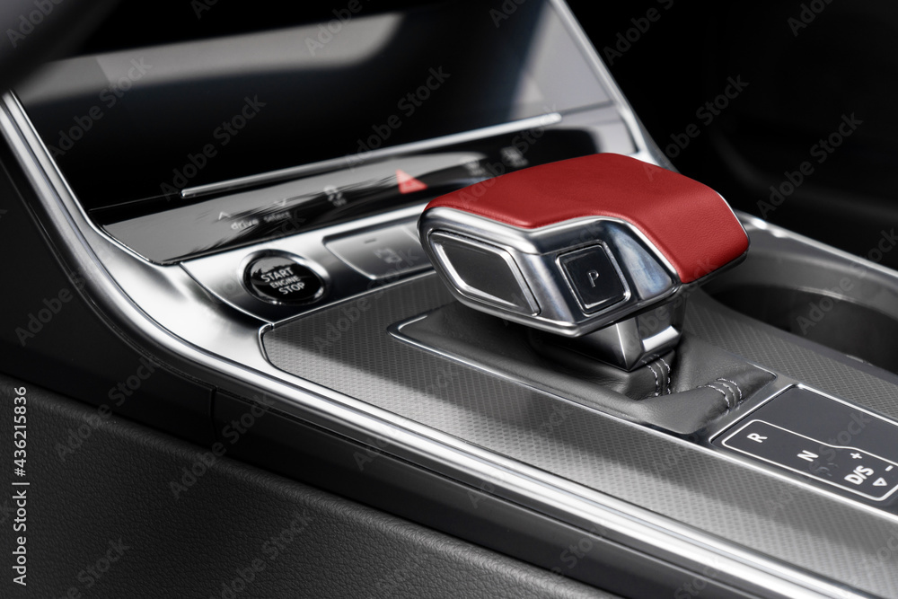 Automatic gear stick of a modern car. Modern car interior details ...