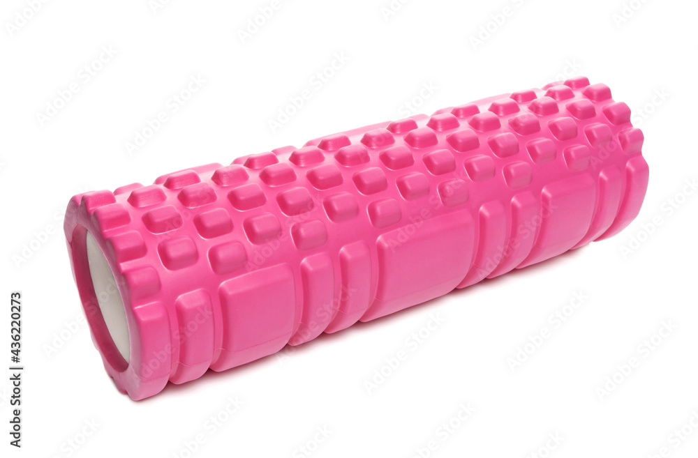 Pink massage roller made of lumpy foam. Foam rolling is a myofascial ...