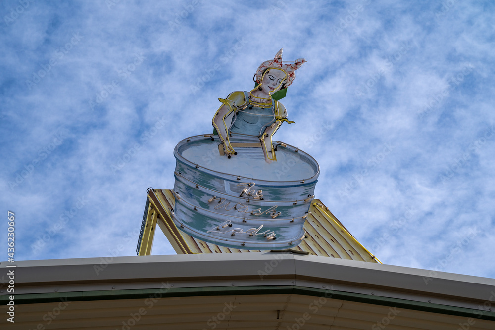 Tucamcari, New Mexico - May 7, 2021: Old vintage neon sign for the Wash ... Tucamcari, New Mexico - May 7, 2021: Old vintage neon sign for the Wash ...