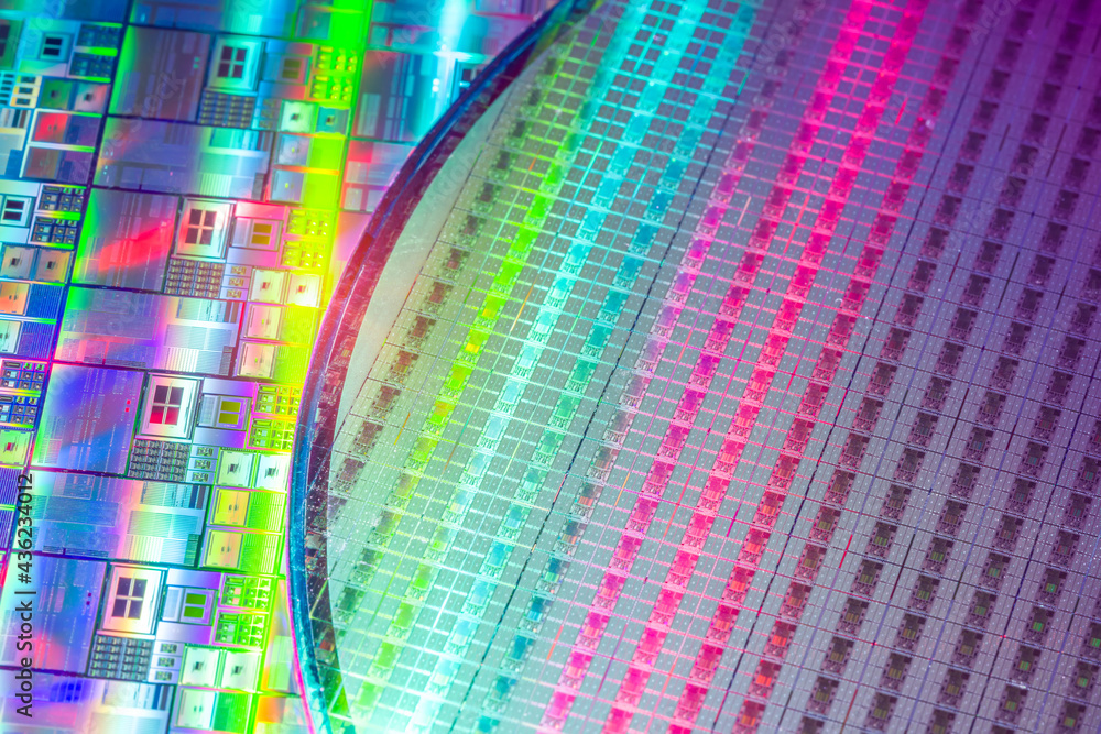 silicon wafer reflecting different colors. Stock Photo | Adobe Stock