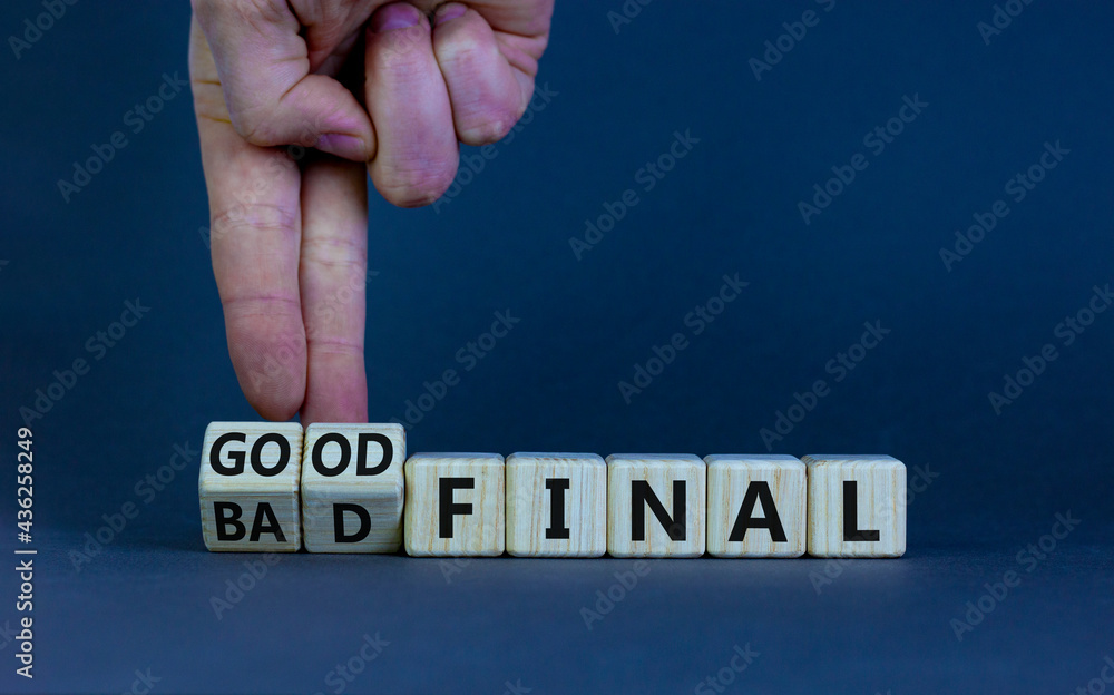 Good or bad final symbol. Businessman turns wooden cubes and changes ...