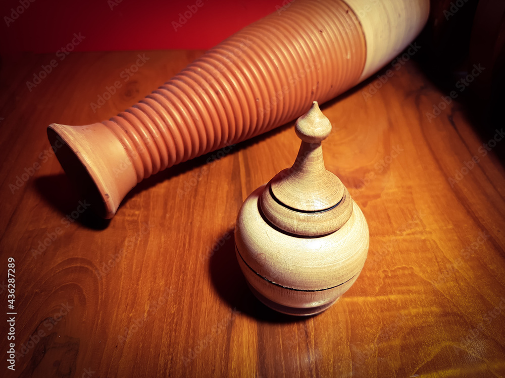 Wood carved Sindur pot with wooden and vibrant red background Stock ...
