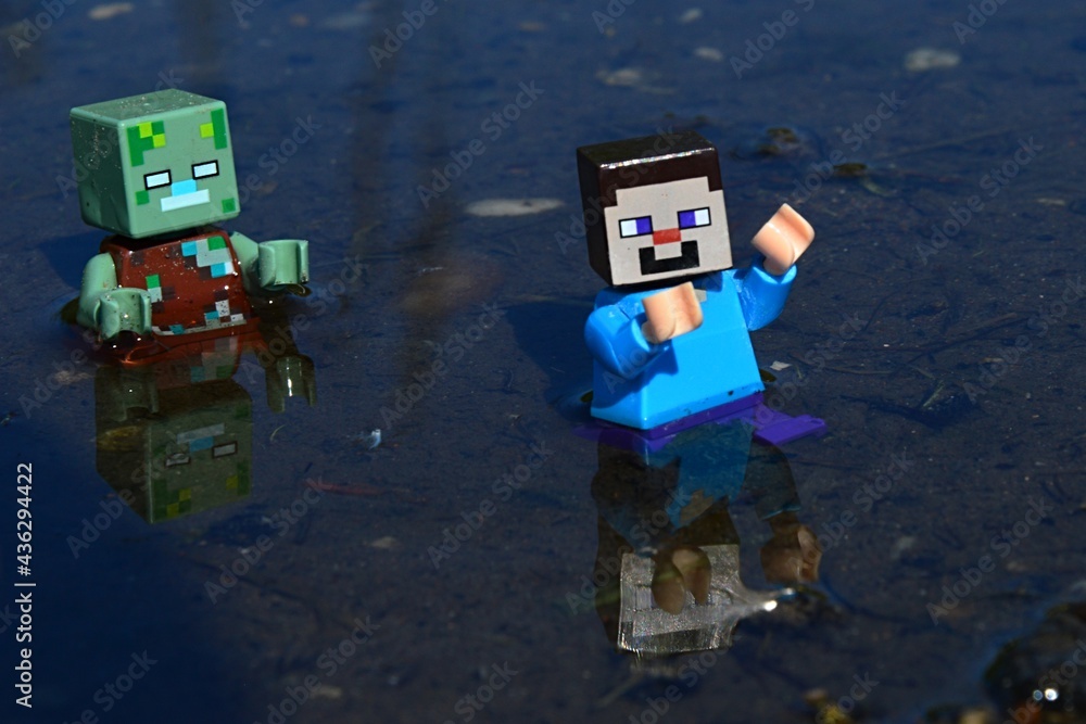 Fotka „Minecraft LEGO figure of drowned zombie mob chasing scared ...