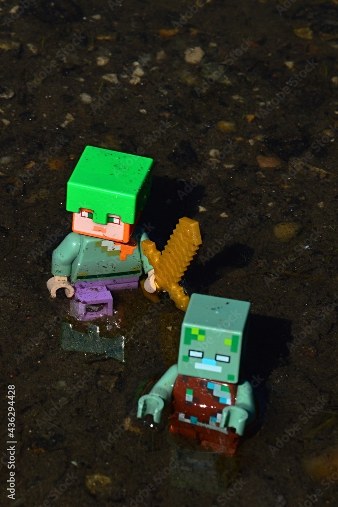 Minecraft LEGO figure of Alex with golden sword and tortoise shell ...