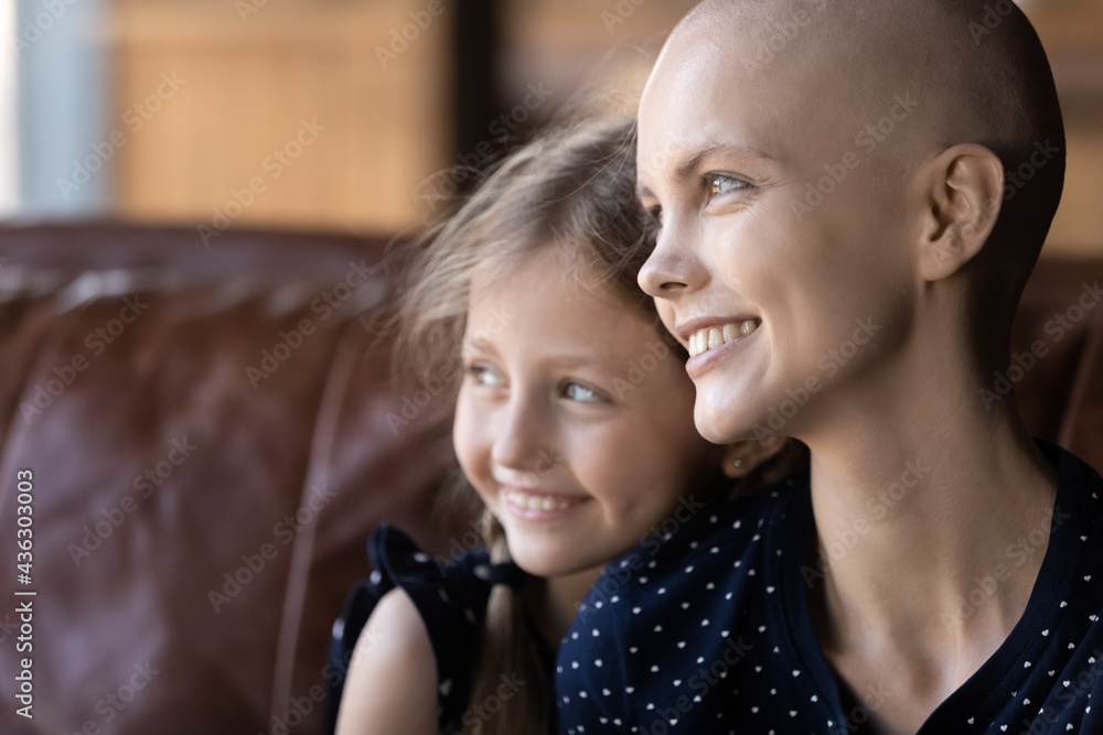 Happy young hairless woman fighting against cancer, spending time with ...