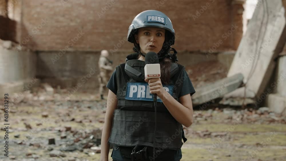 POV Camera view, female war journalist correspondent wearing ...