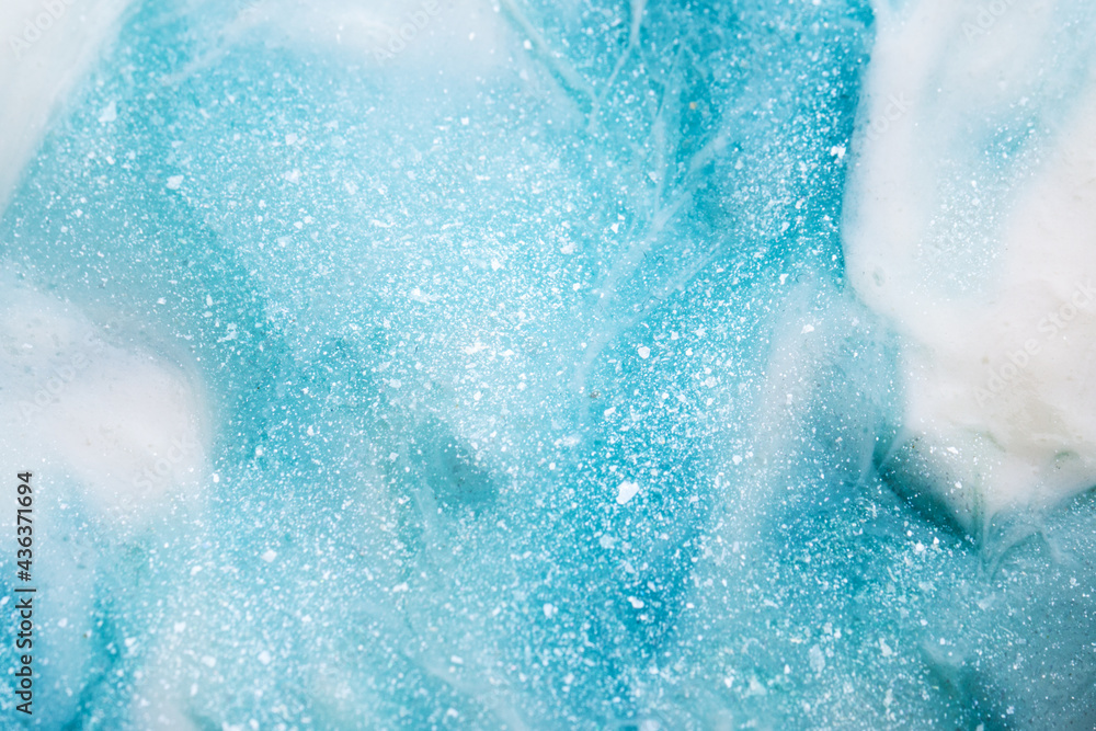 Liquid art gel blue gradient background with glitter. Slime toy ...