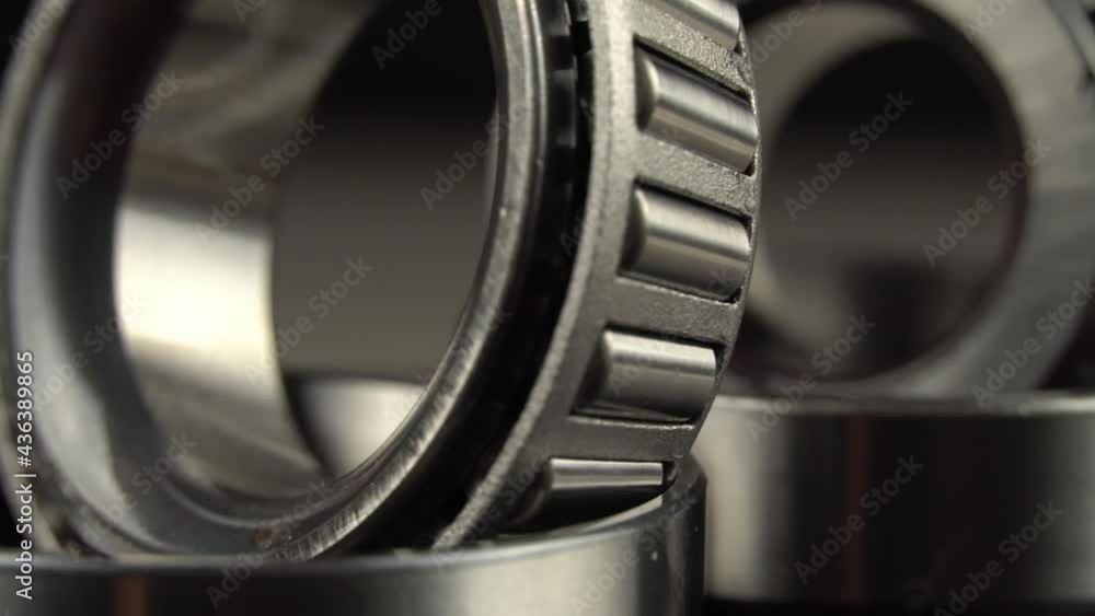 Cyclic seamless video with bearings rotating on a turntable on a black ...