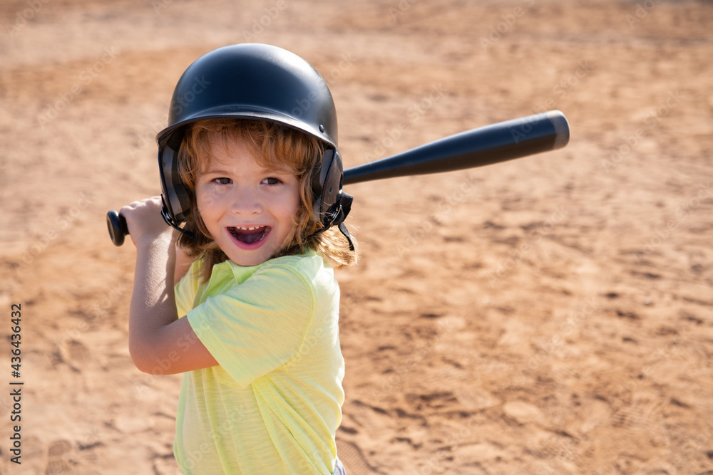 Child baseball player focused ready to bat. Kid holding a baseball bat ...