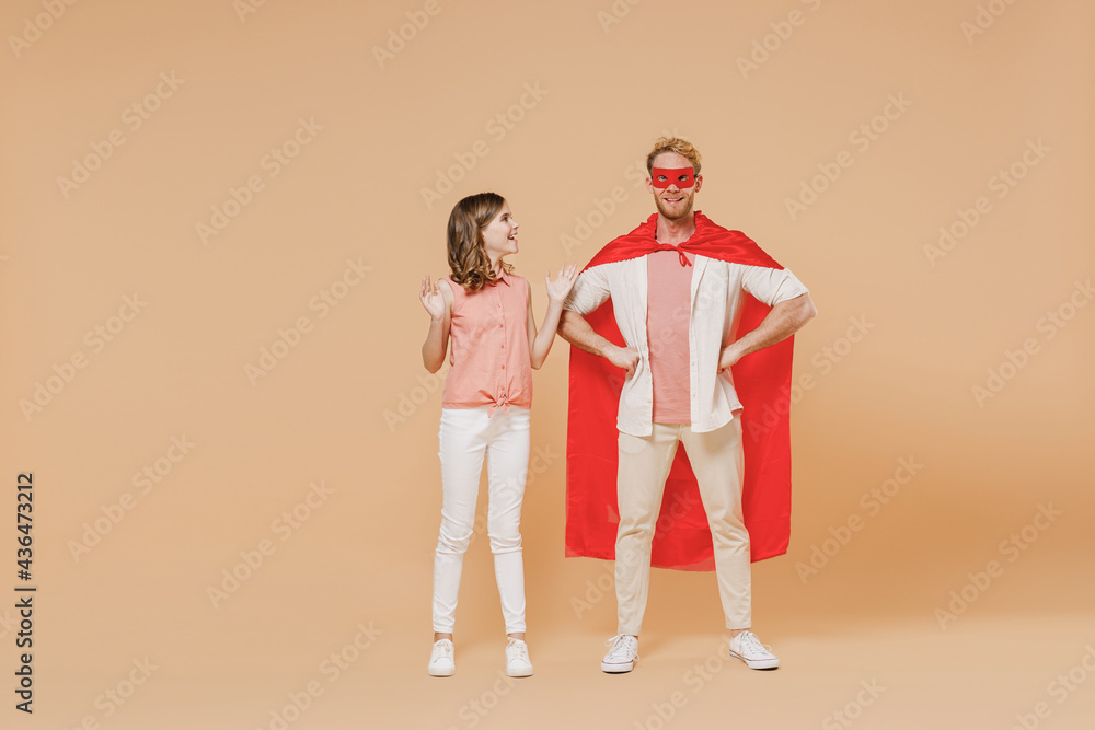 Full length smiling cool powerful man stand akimbo in superhero suit ...