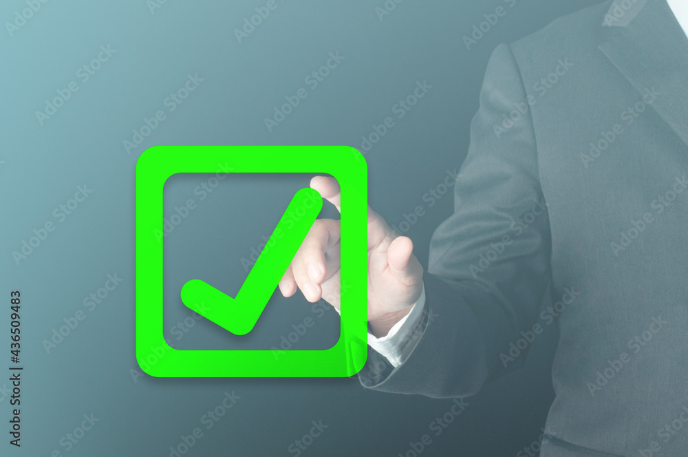 Foto de business person use finger press virtual green check mark sign ...