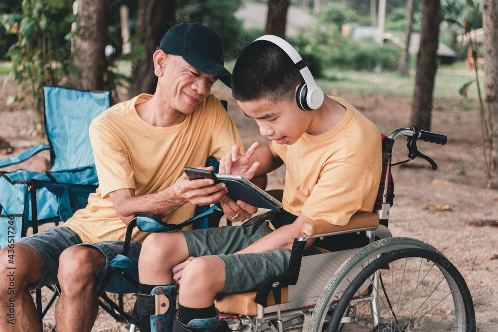 Father take care for disabled child in wheelchairs with love, Daily ...
