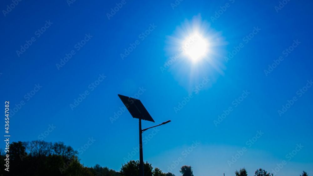 Modern street lighting pole with solar panel Stock Photo | Adobe Stock