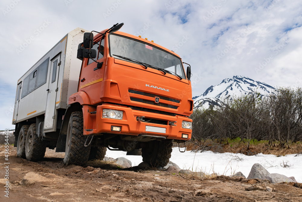 Russian off-road passenger expedition truck KamAZ on mountain road in ...