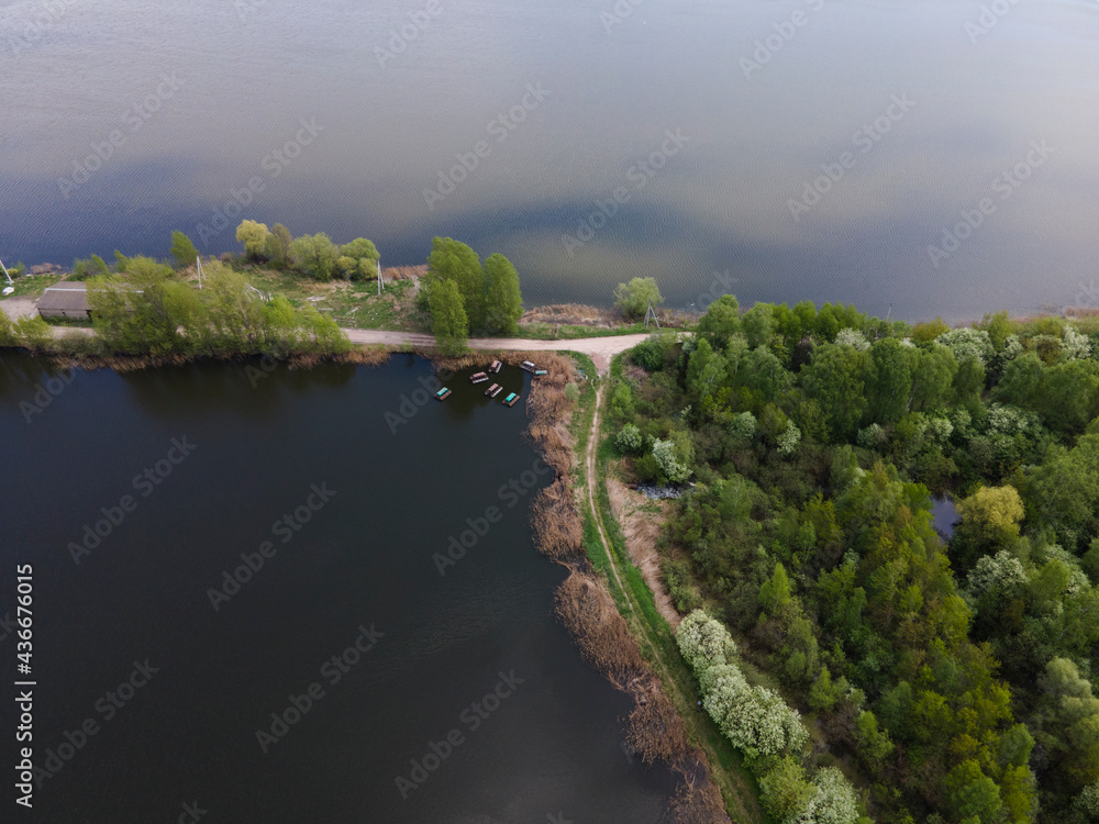 Top view of the picturesque road between the reservoirs. Boats near the ...