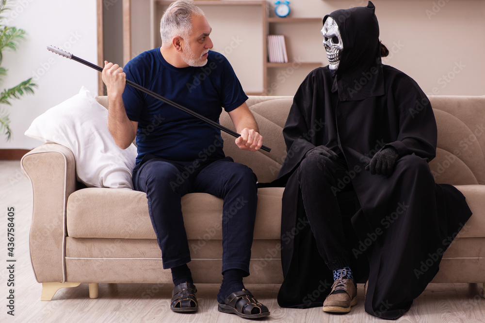 Devil visting old dying man at home Stock Photo | Adobe Stock