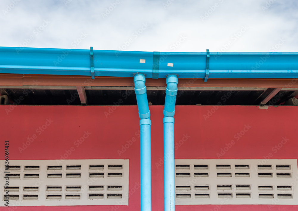Blue plastic rain gutter with two downspoutl. plastic guttering system ...