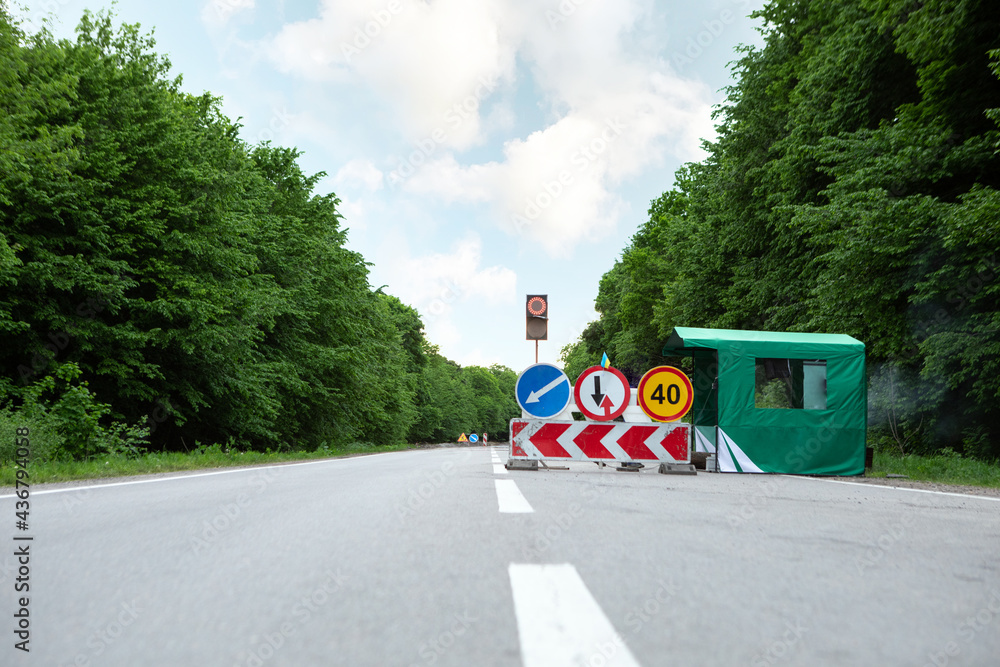detour sign on the road. traffic sign detour. barrier at the road ...