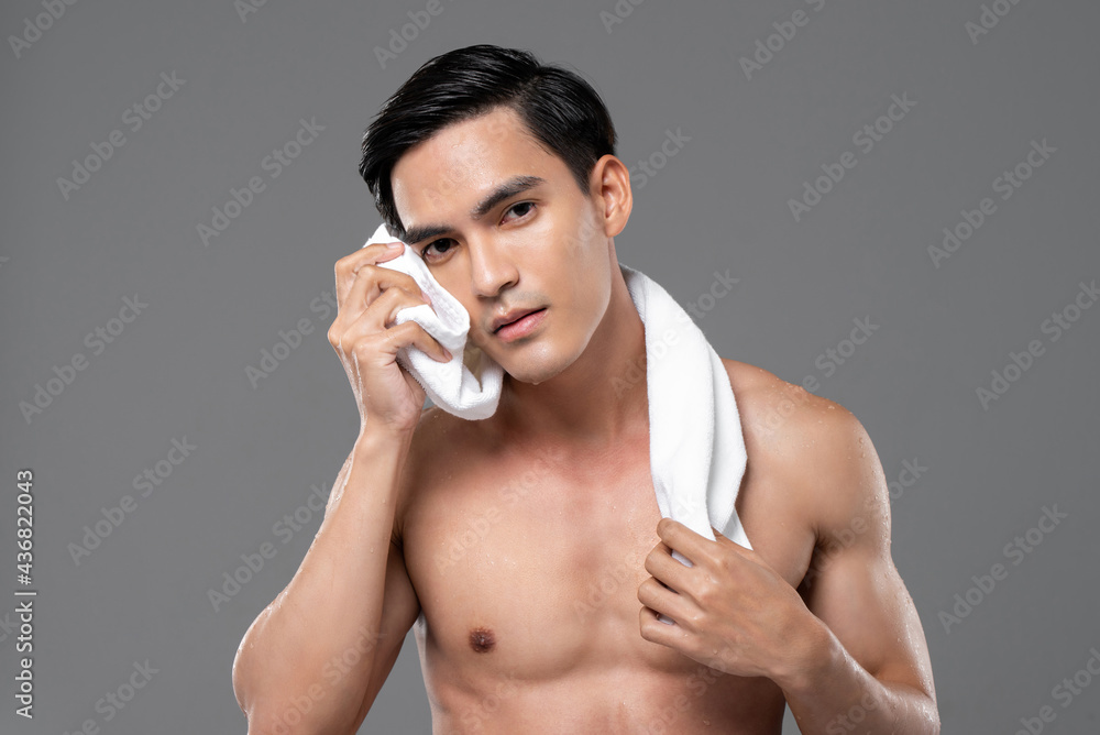 Beauty and skin care portrait of shirtless handsome young Asian man ...