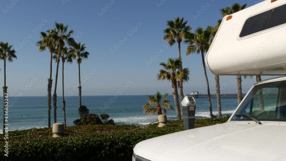 Motorhome trailer or caravan for road trip. Waterfront tropical palm ...