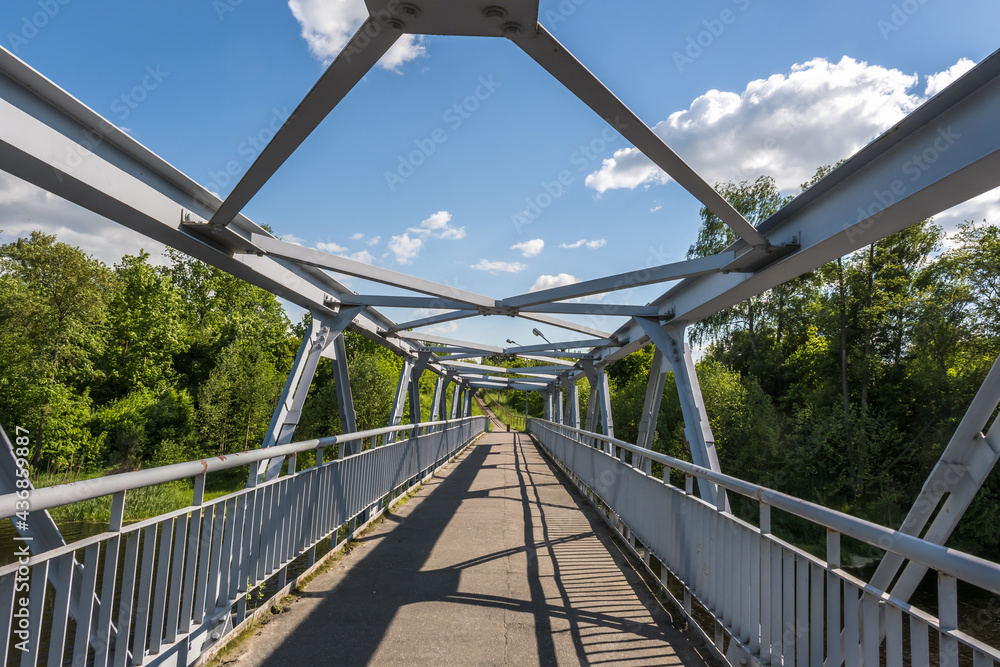 iron steel frame construction of bridge on blue sky background. bridge ...
