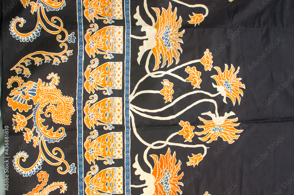 Batik is the art of painting cloth using wax and natural or artificial ...