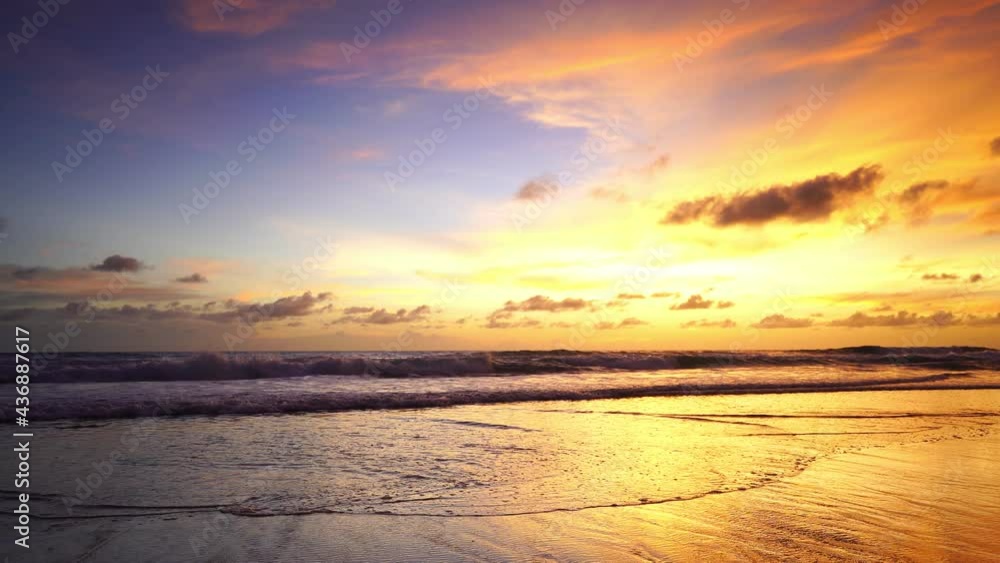 Dramatic sea sunset or sunrise Burning golden sky and shining golden ...